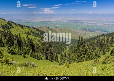 Mountains and Kerege Tash village near Karakol, Kyrgyzstan Stock Photo ...
