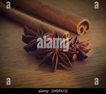 Anise star spices and cinnamon sticks on grey rystic wooden background ...