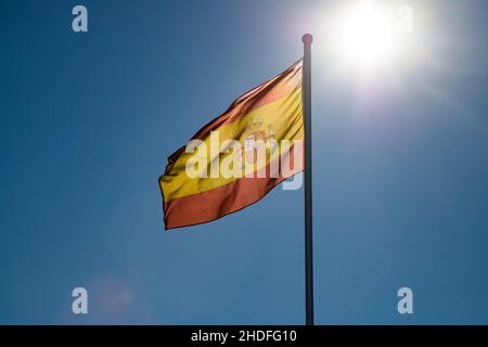 spanish flag on blue background Stock Photo - Alamy