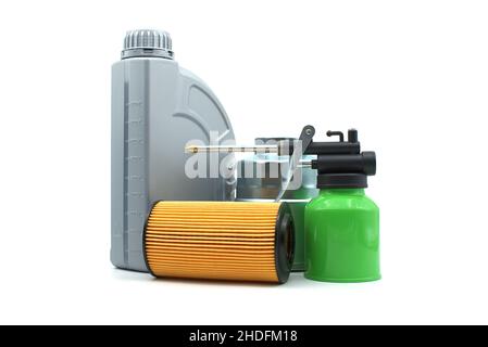 Motor oil, hand oiler and oil filters isolated on a white background ...