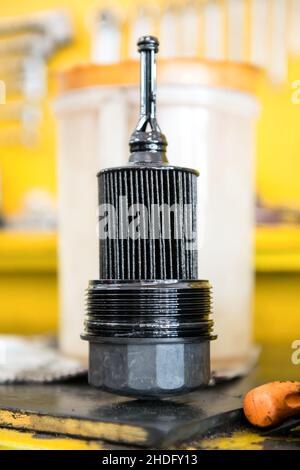Used car engine oil filters Stock Photo - Alamy