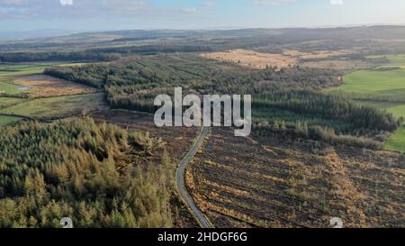 Aerial Photograph Of a Forestry and Village called Cross Inn ...