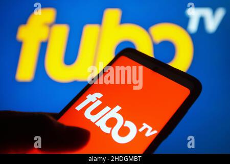 In this photo illustration, FuboTV logo seen displayed on a smartphone ...