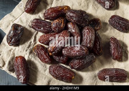 Organic Raw Dry Dates in a Pile Stock Photo - Alamy