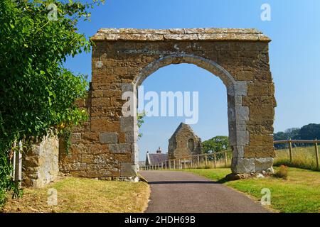 UK, Dorset, Abbotsbury Abbey Remains, St Nicholas Church and Mill Pond ...