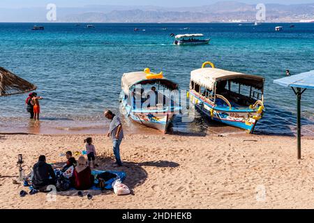 A Jordanian Family On The Public Beach In Aqaba, Aqaba Governorate ...