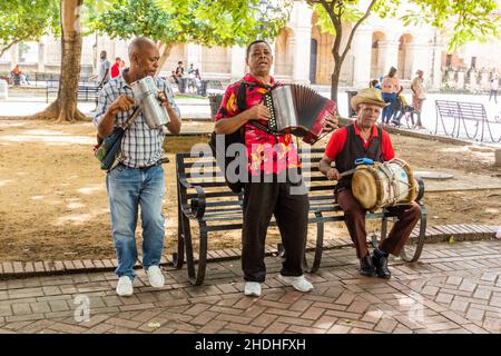 Street musicians in the Dominican Republic. Santo Domingo Columbus Park ...