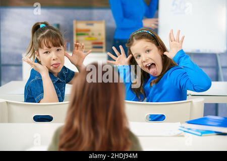 A female teacher sitting on a naughty girl and spanking her exposed ...