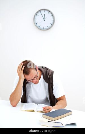 Young male student in time management concept at home Stock Photo - Alamy