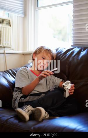 boy smoking cigarettes Stock Photo - Alamy