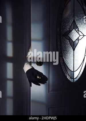 Burglar Entering In Room Through The Window At Nighttime Stock Photo ...