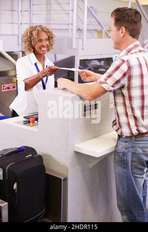 Airport Staff at Counter: Female Airline Check-in Attendant Checking ...