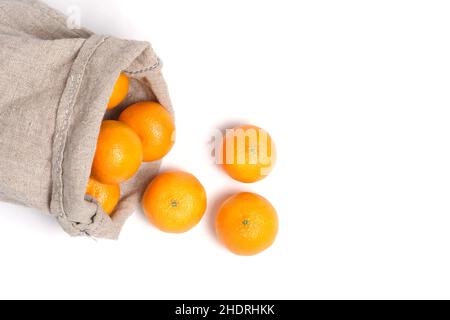 Scattered tangerines from bag on white background Stock Photo - Alamy
