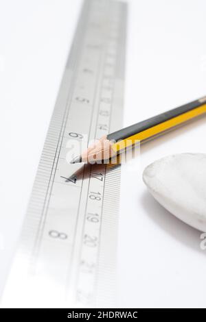 Pencil, rulers and eraser. Isolated on white background Stock Photo - Alamy