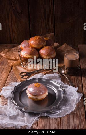 Chocolate Berliner pastry for carnival and party. German Krapfen or ...