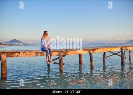 relaxation, sitting, pier, relax, piers Stock Photo - Alamy