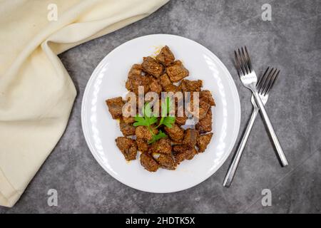 Fried liver cubes on a dark background. Turkish Traditional Food ...