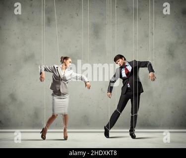 depending, puppet, externally controlled, puppets Stock Photo - Alamy