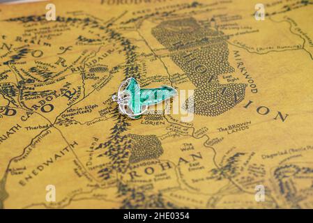 Elven Lorien brooch lies on Middle-Earth map Stock Photo - Alamy