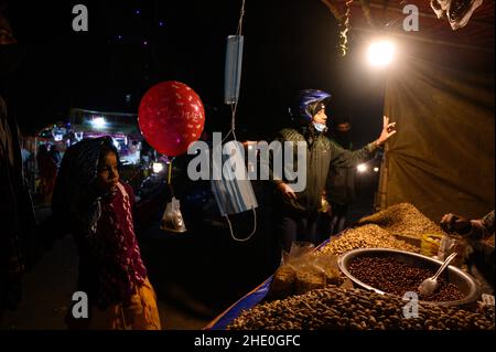 An annual rural winter fair. Due to the coronavirus people have been requested to use mask and ...