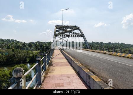 View of the tied steel arch Gandaulim - Marcel Bridge over Cumbarjua ...