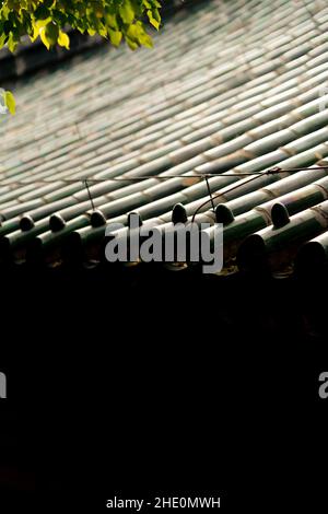 Vertical shot of a building's roof with tiles Stock Photo - Alamy