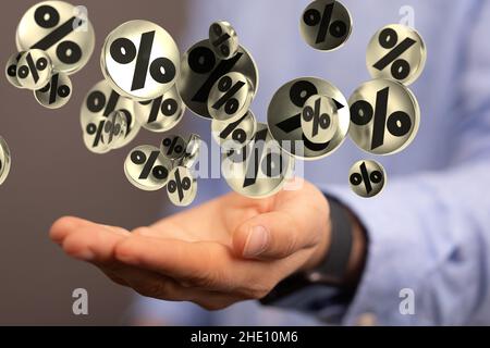 Male's hand holding an illustration of a sale percent discount % sign ...