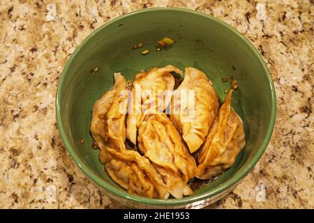 Asian dumplings in bowl Stock Photo - Alamy