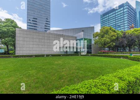 beautiful green field near modern office building Stock Photo - Alamy