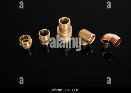 Plumbing valves, ball valves, fasteners and fittings on the white ...