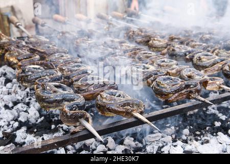 Eels on the spit, typical Sardinia recipe, Campidano, Sardinia, Italy ...