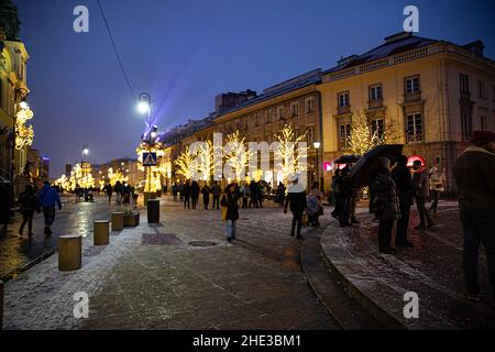 5 of December 2021 Warsaw, Poland. Nowy Swiat street. Festive Christmas ...