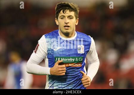 BARNSLEY, UK. JANUARY 8TH Anthony Glennon of Barrow warms up during the ...