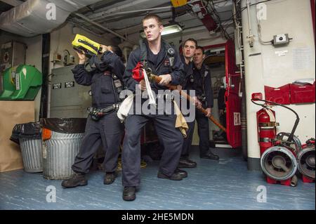 Sailors conduct a damage control drill aboard USS Bonhomme Richard ...