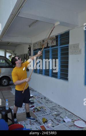 Sailors work in Malaysia Stock Photo - Alamy