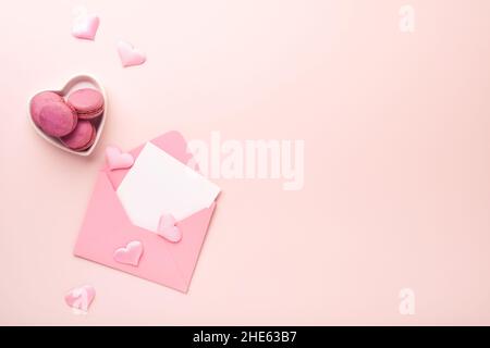 Envelope and heart shaped cookie on pink background. Valentines Day ...