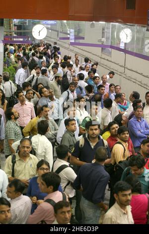 Passengers wait for their turn to board in a metro train at metro ...