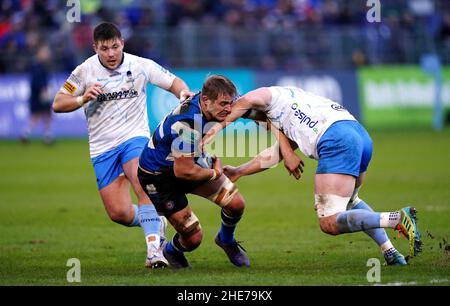 Bath Rugby's Ted Hill is tackled by Northampton Saints' Tommy Freeman ...