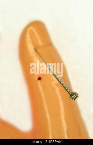 acupuncture demonstration on hand model Stock Photo - Alamy