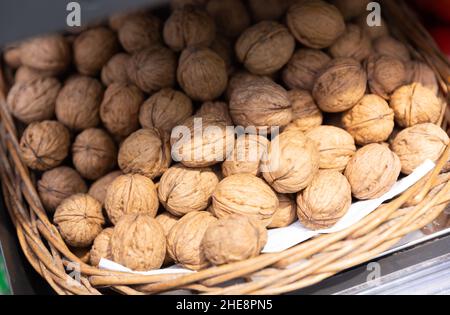 Whole walnuts in box at farmers market Stock Photo - Alamy