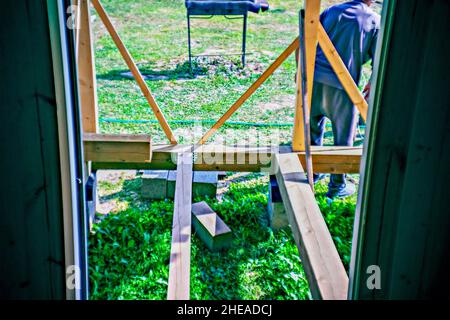 unfinished rural wooden house in summer, lomography Stock Photo - Alamy