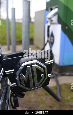 MG EV long range estate charging at a Genie point charge point at ...