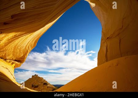 Hiker in the Great Chamber grotto, Utah, USA. Travel and journey scene ...