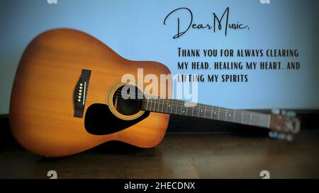 Inspirational quotes with guitar background Stock Photo - Alamy