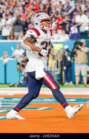 New England Patriots' Damien Harris runs against the Buffalo Bills ...