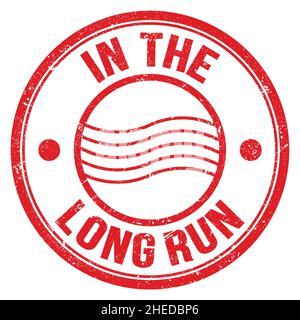IN THE LONG RUN text written on green-black round stamp sign Stock ...