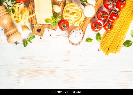 Italian food background at white bkitchen table Stock Photo - Alamy