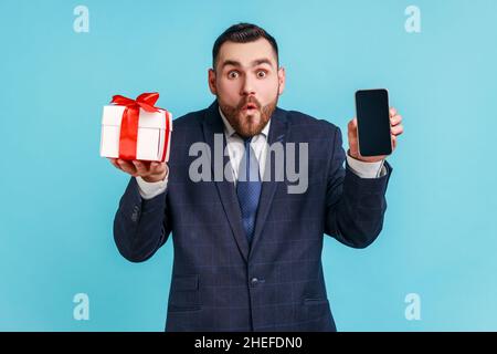 Businessman with mouth mock-up showing thumbs up on video call over ...