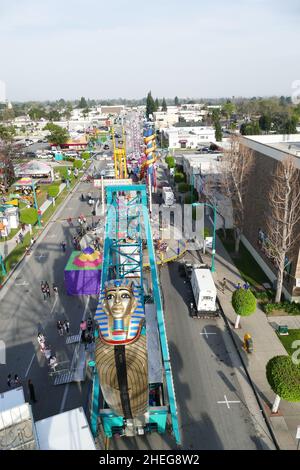 Outdoor sunny view of pendulum amusement ride, rotate and swing down ...