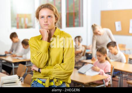 Girl feeling upset after getting bad mark at school Stock Photo - Alamy